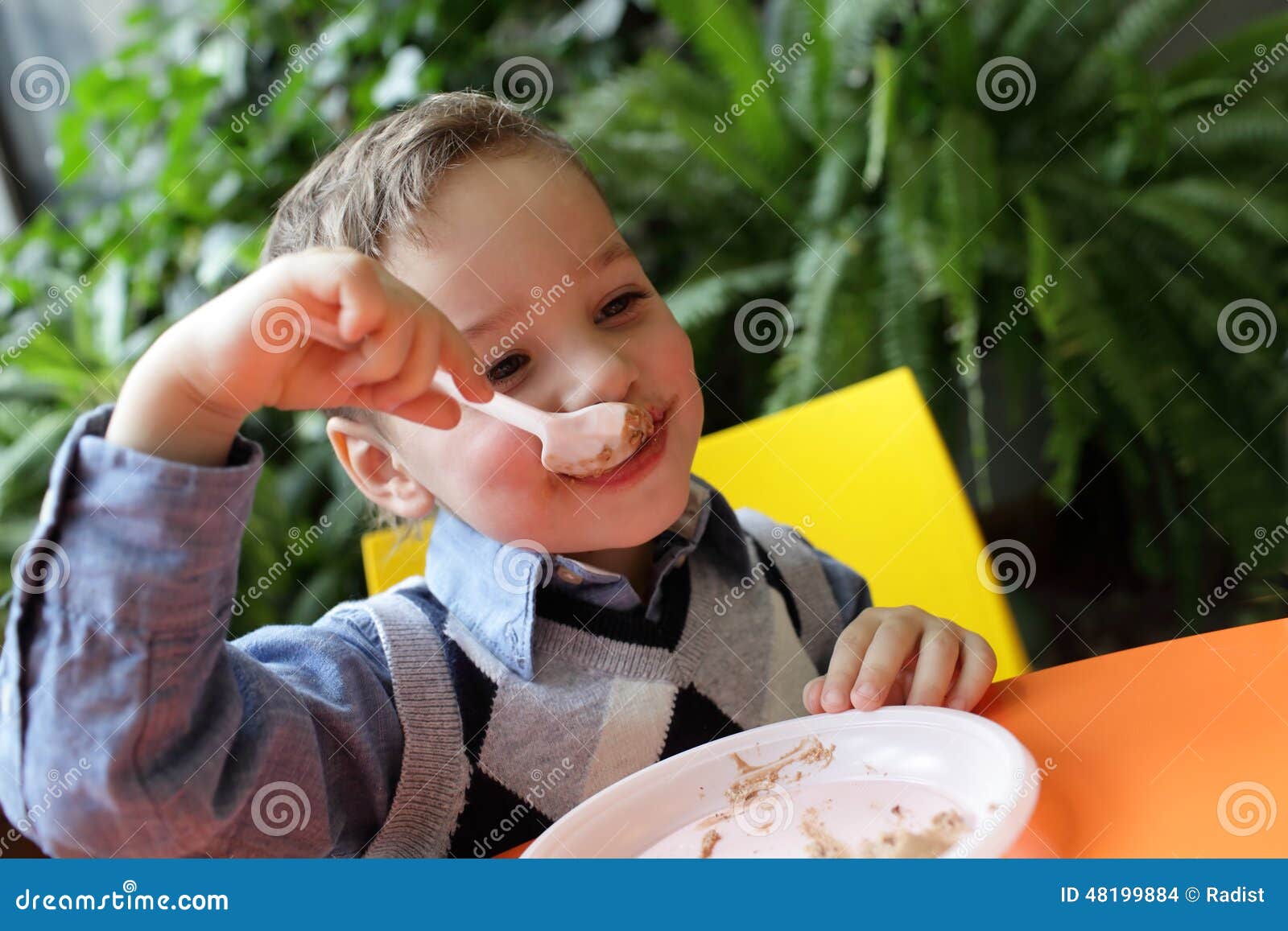 Kid eating cake stock photo. Image of horizontal, cute - 48199884