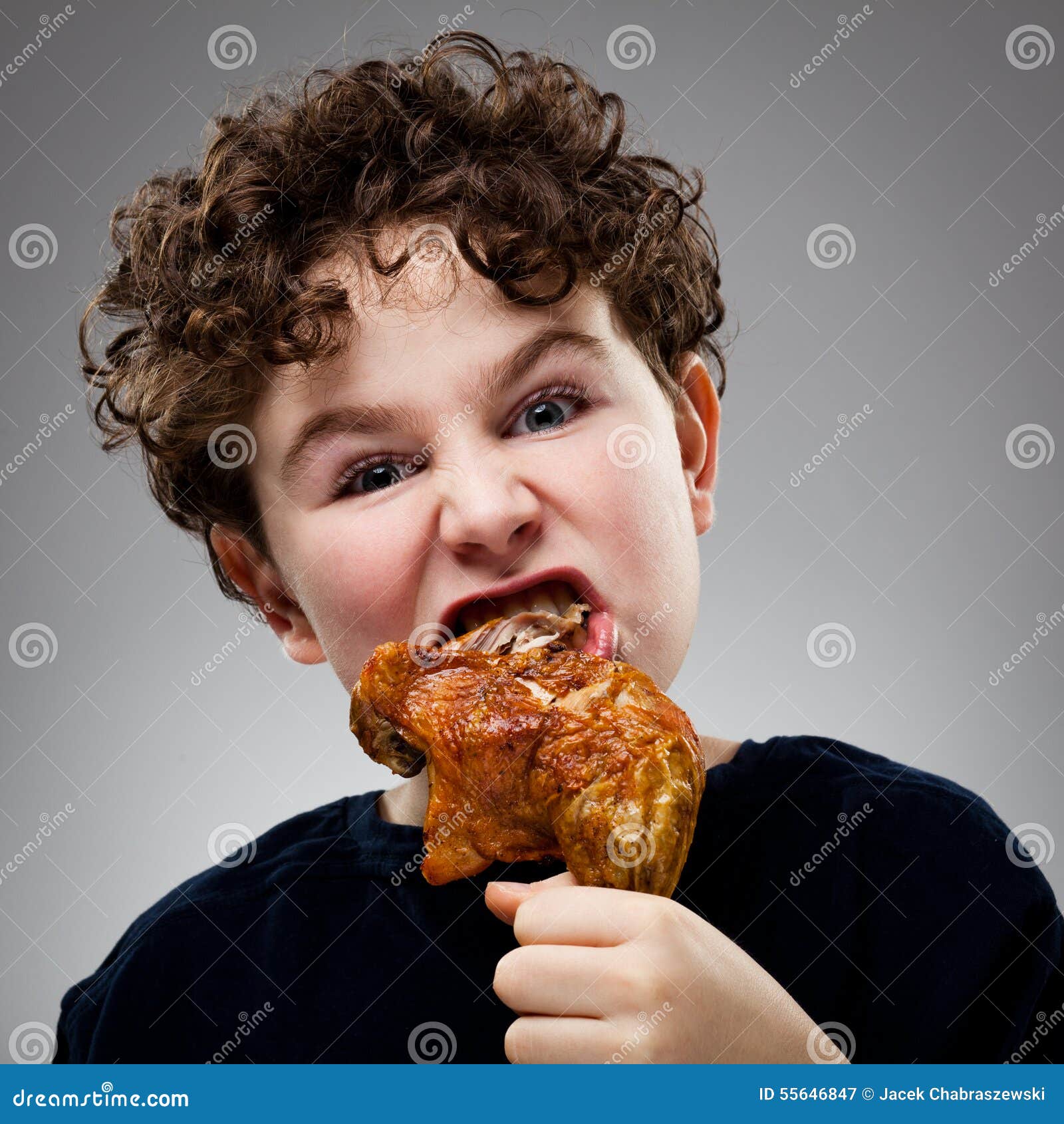 Kid eating chicken leg stock image. Image of drumsticks - 55646847