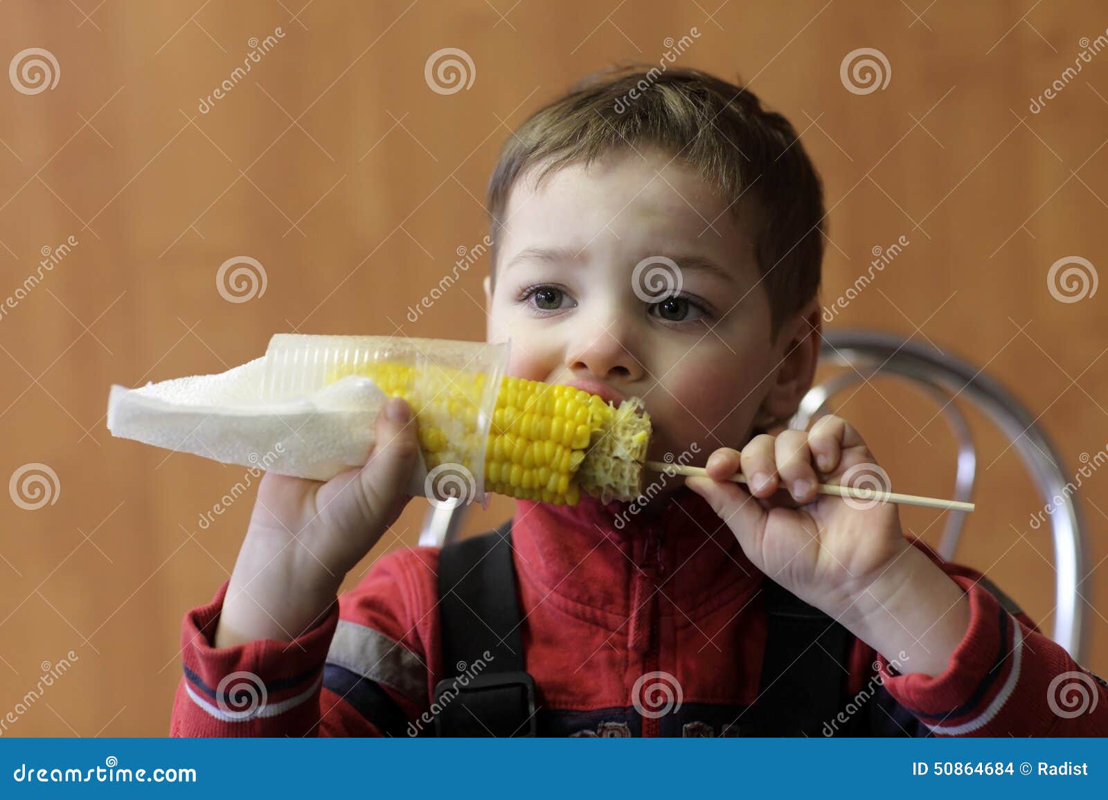 Kid eating corn stock photo. Image of brown, life, caucasian - 50864684