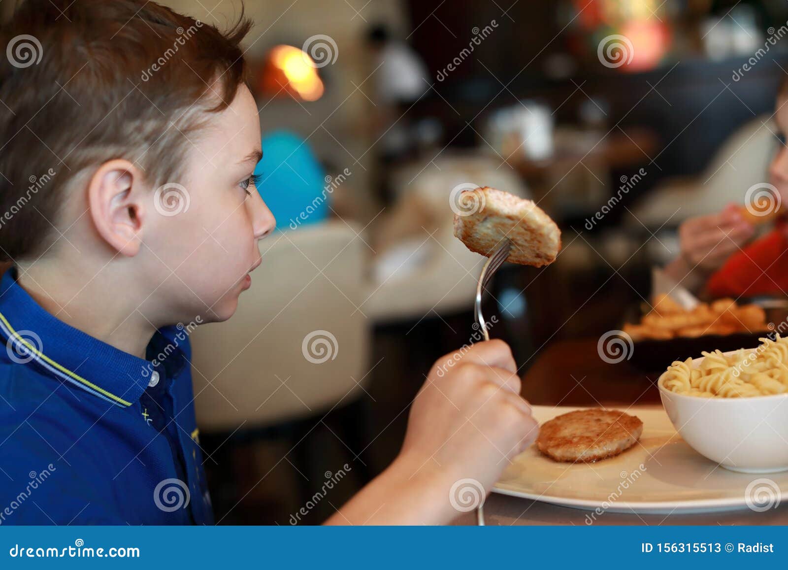Kid Eating Cutlet. with Macaroni Stock Image - Image of face, healthy ...