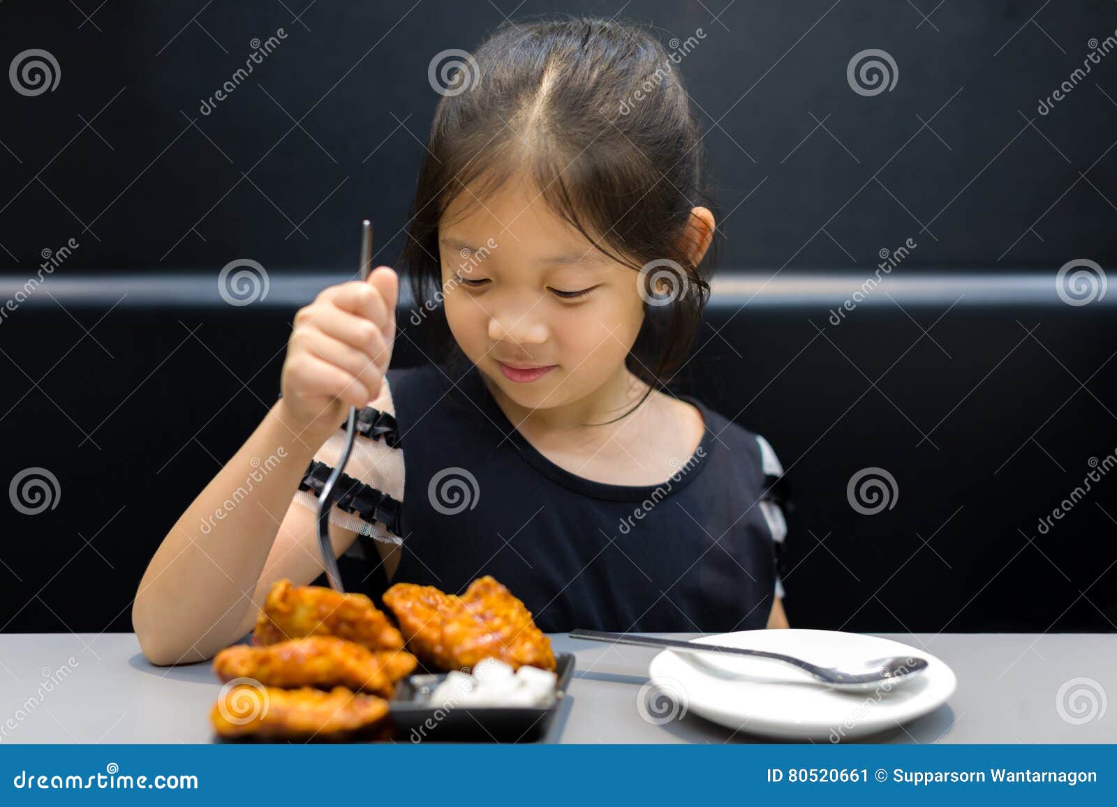 Kid Eating Fried Chicken stock image. Image of protein - 80520661