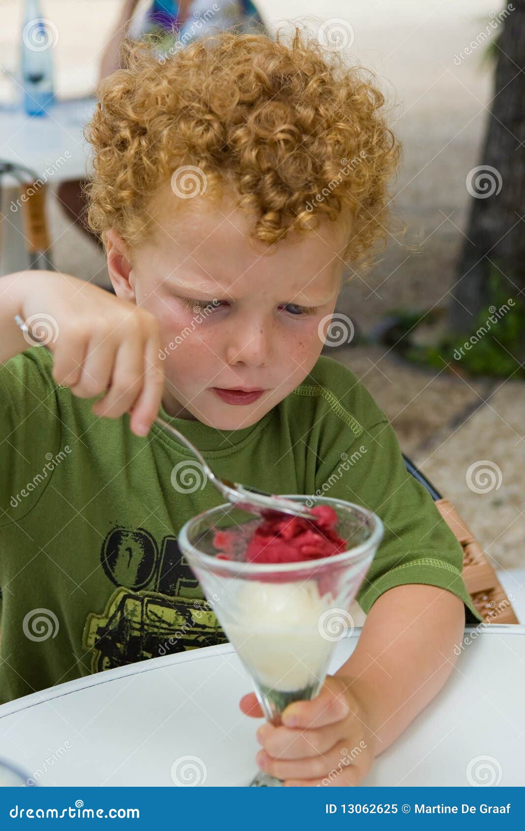 Kid eating ice cream stock image. Image of huge, handling - 13062625