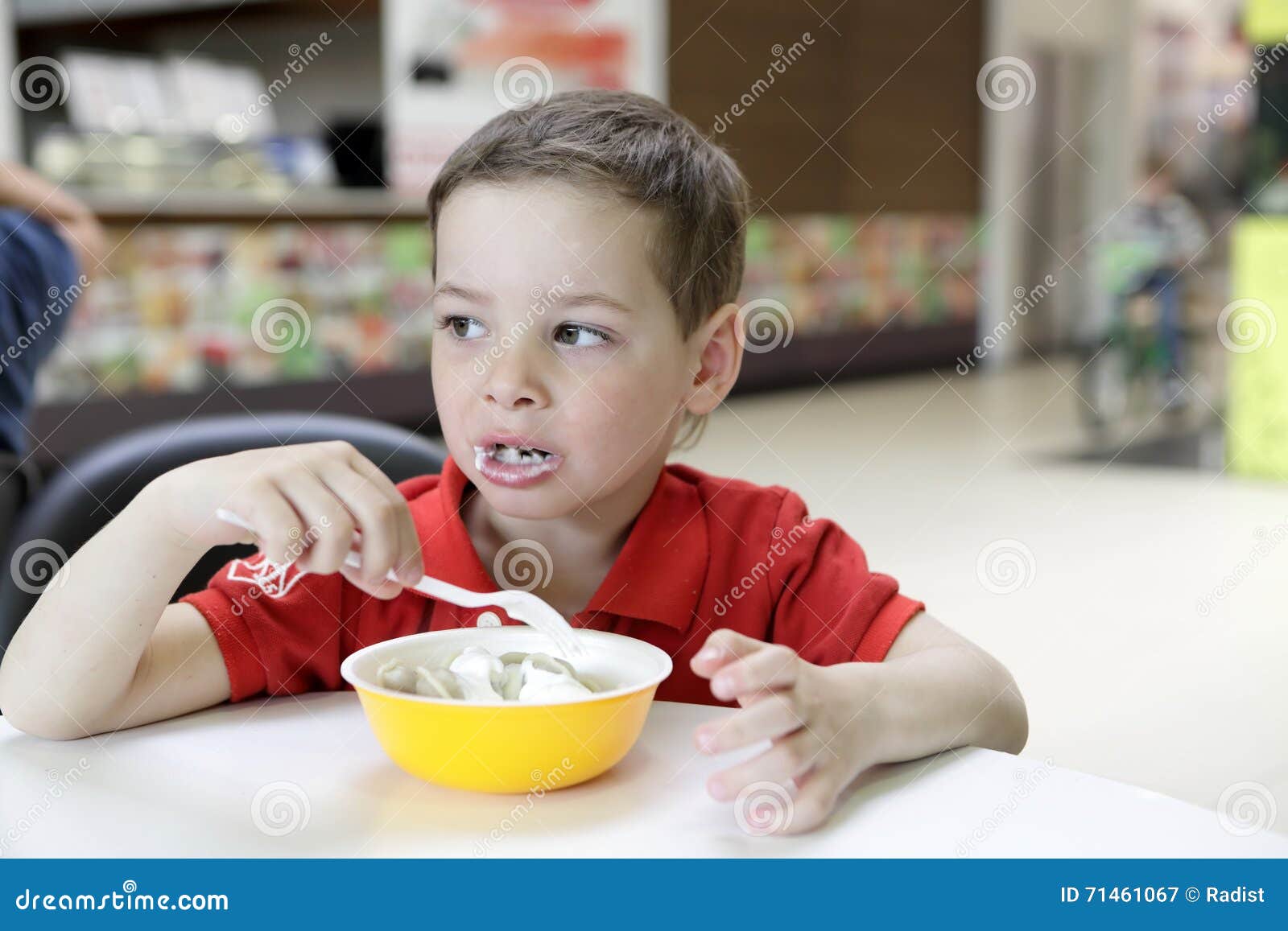 Kid Eating Meat Dumplings with Sour Cream Stock Image - Image of ...