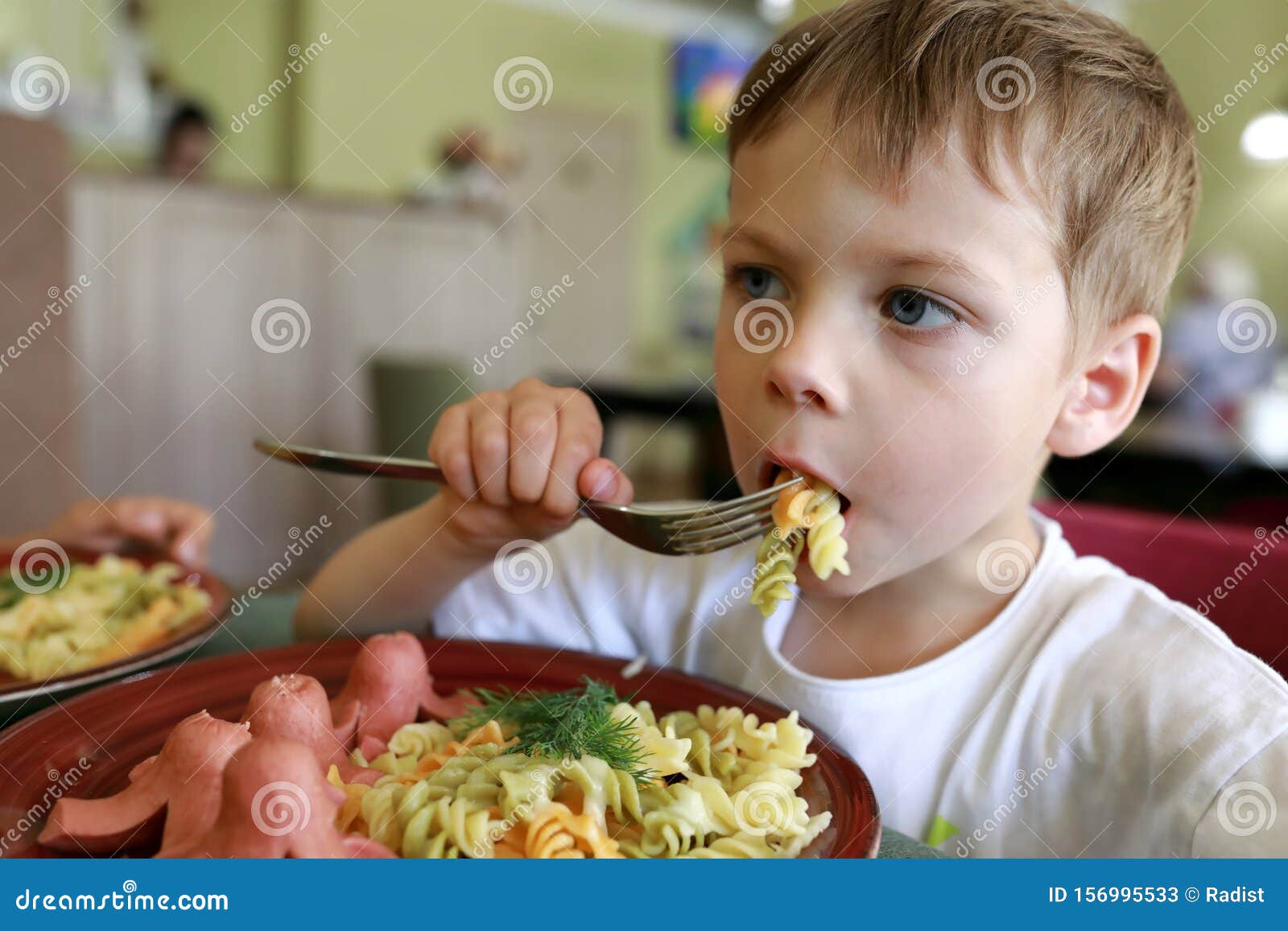 Kid Eating Pasta with Sausages Stock Image - Image of favorite, dill ...