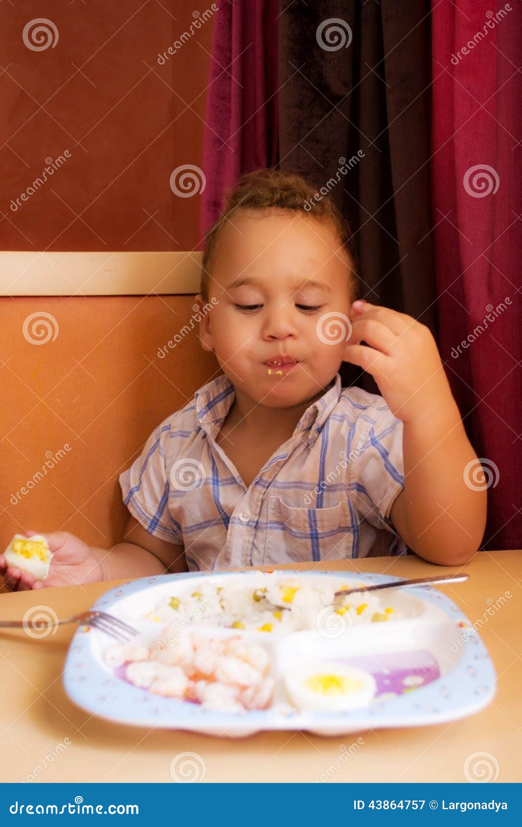 Kid eats. stock image. Image of childish, cheerful, breakfast - 43864757