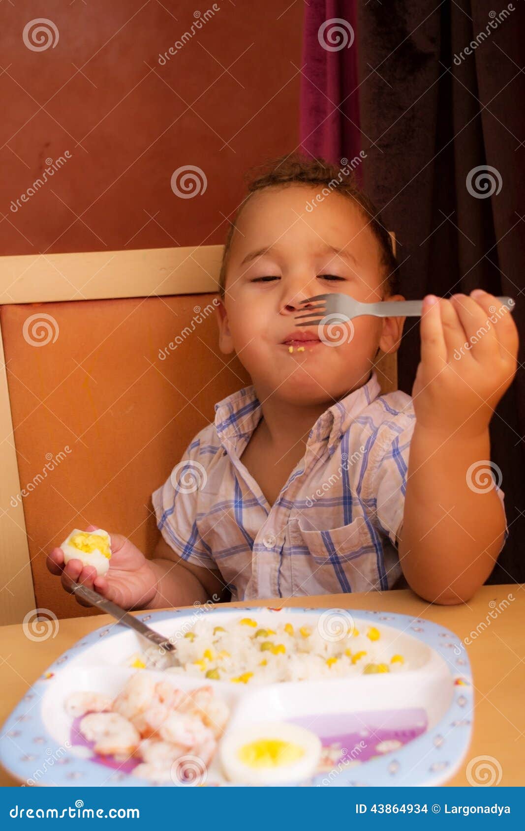 Kid eats. stock photo. Image of child, face, childish - 43864934