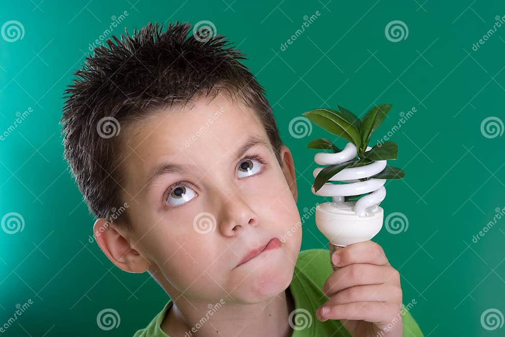 Kid with Energy Saving Bulb Stock Photo - Image of concept, economical ...
