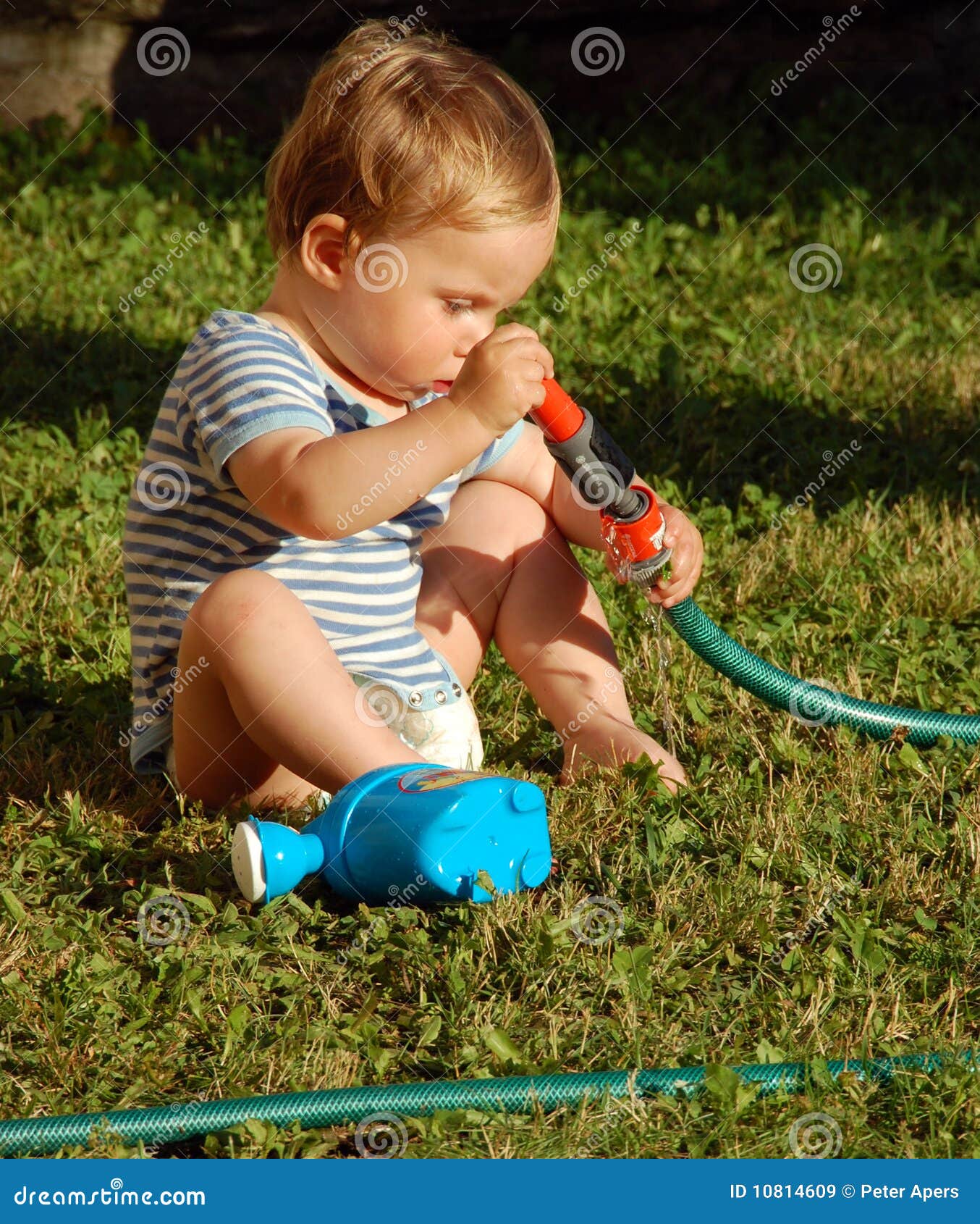 Kid exploring water hose stock image. Image of exploring - 10814609