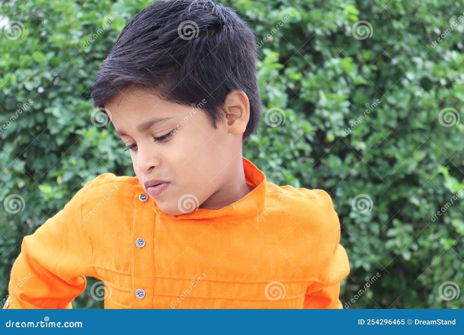A kid expression of shy stock image. Image of people - 254296465