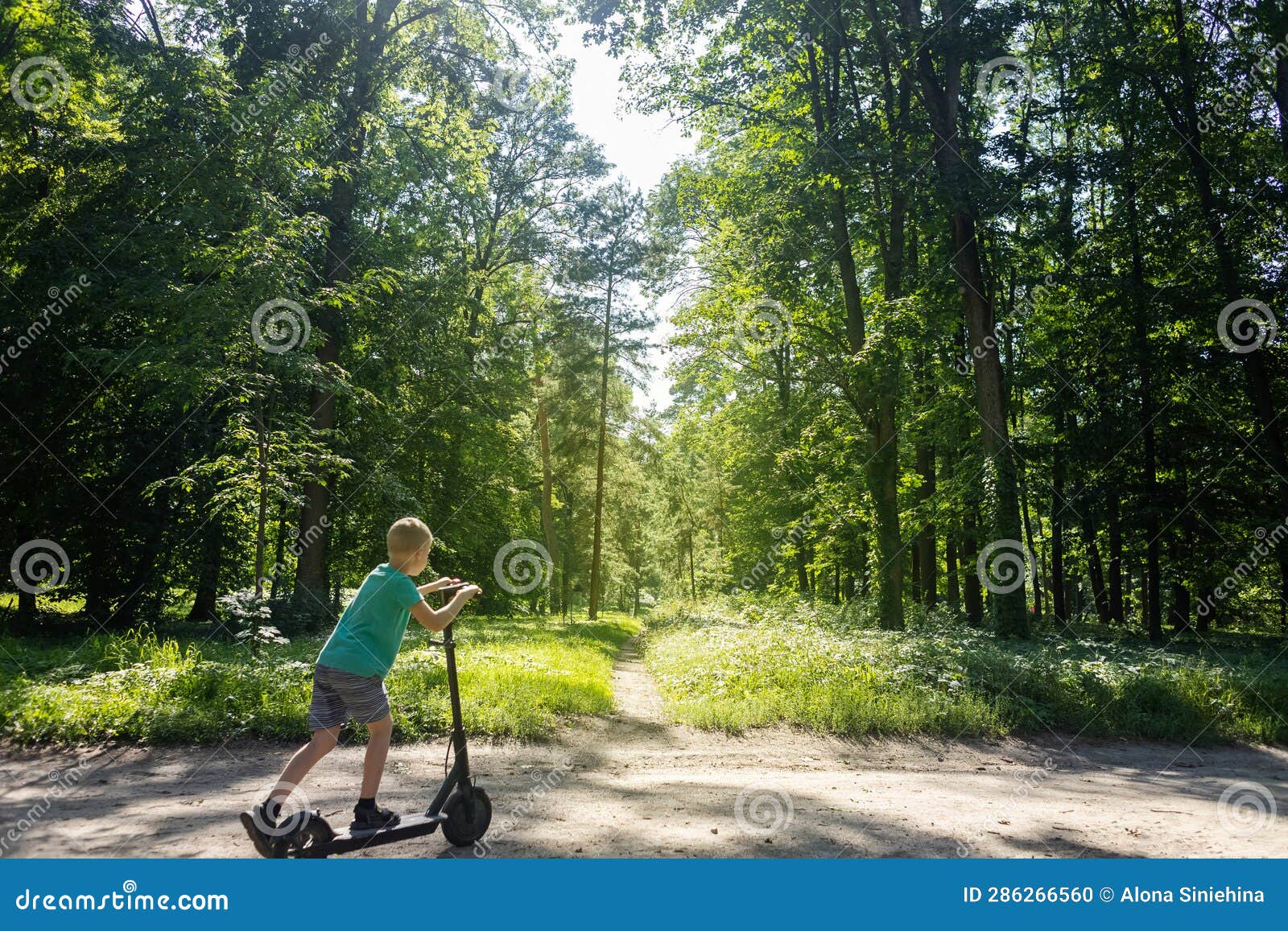 Kid Fall when Riding an Electric Scooter. Riding an E-scooter without ...