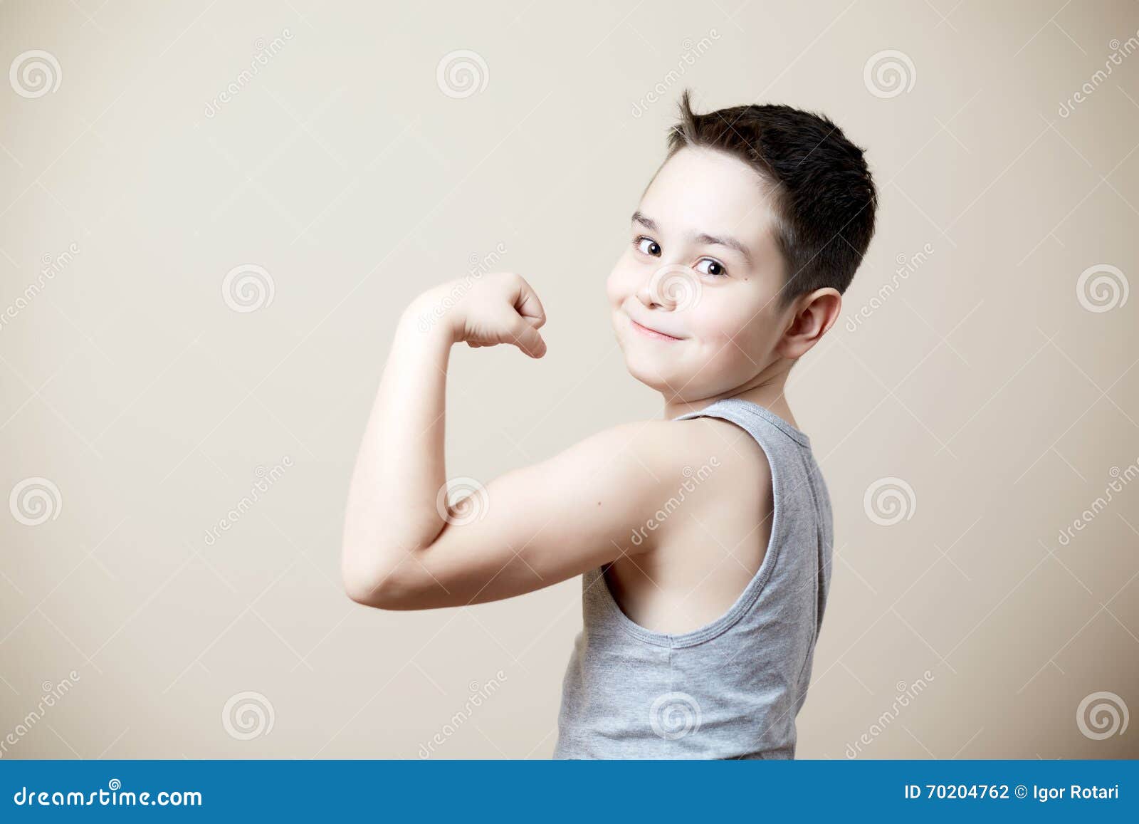 Kid flexing biceps stock photo. Image of body, bodybuilding - 70204762