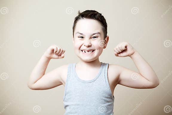Kid flexing biceps stock photo. Image of bodybuilder - 70204434