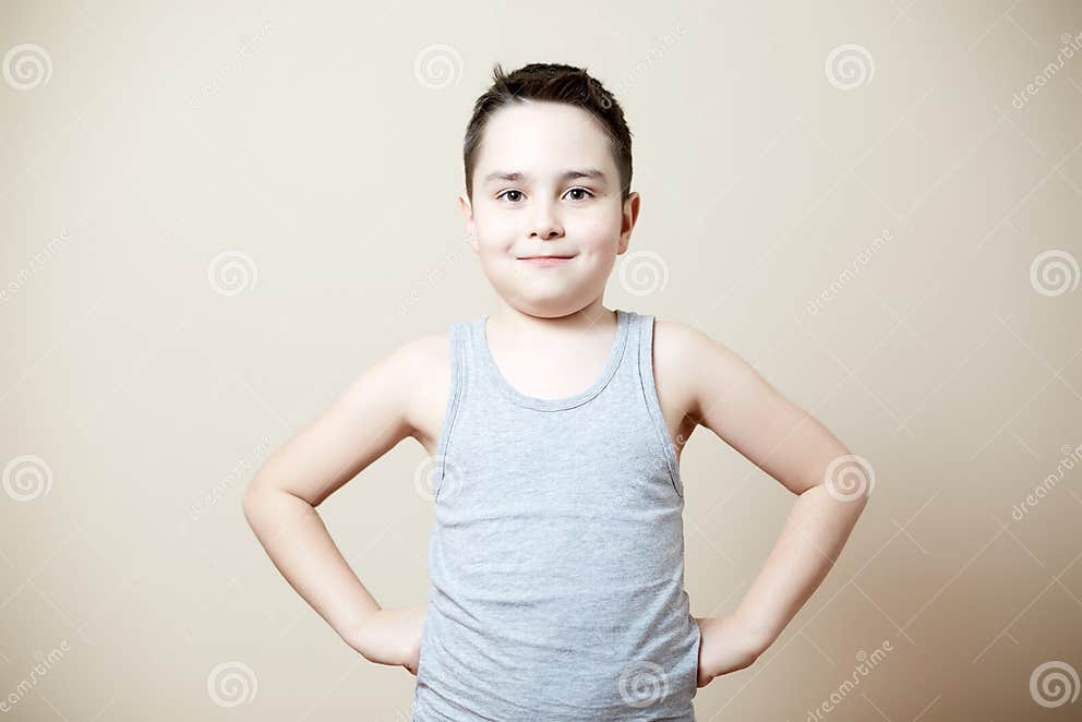 Kid flexing biceps stock photo. Image of athlete, bodybuilder - 70204490