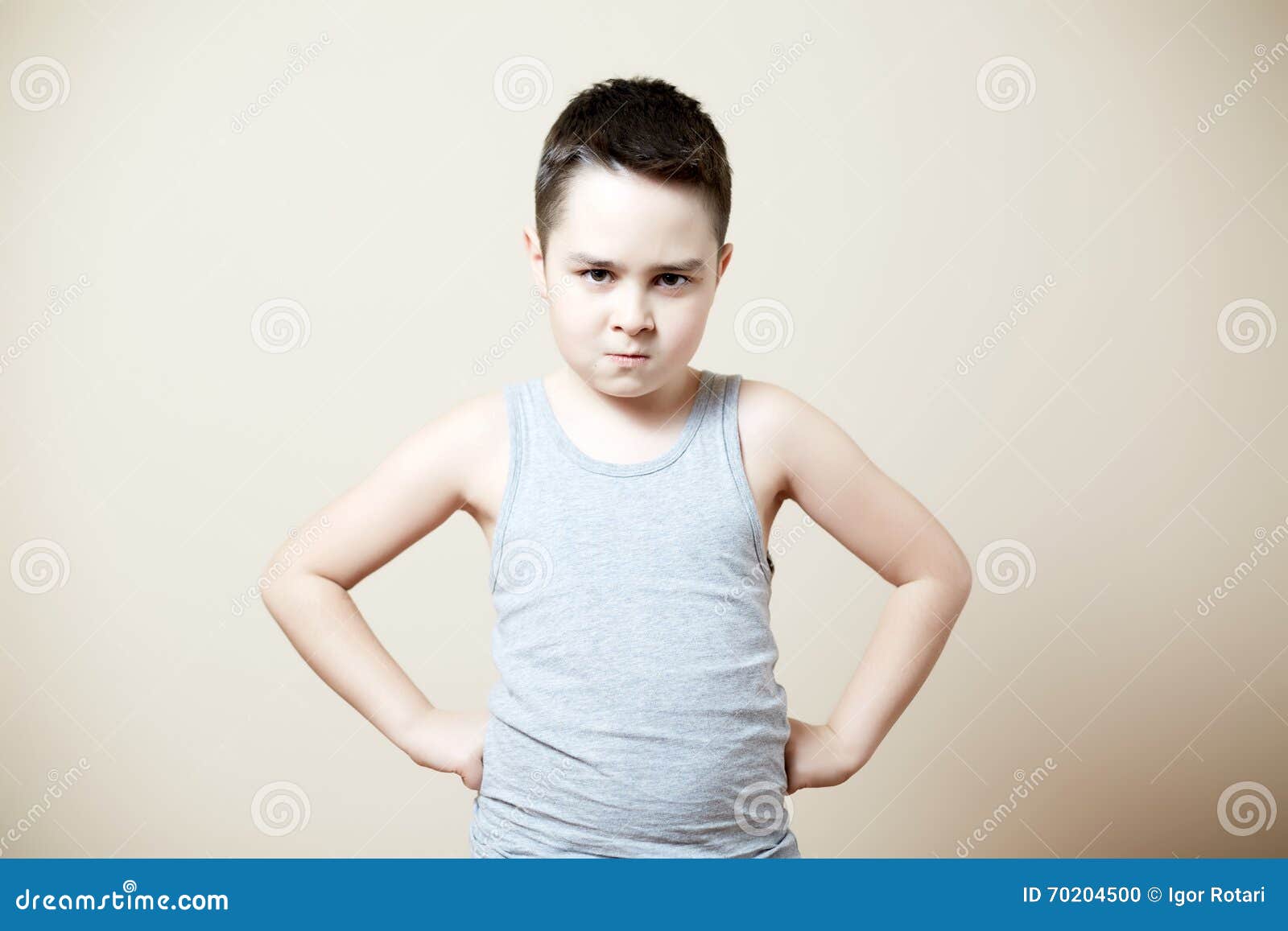 Kid flexing biceps stock photo. Image of muscle, face - 70204500