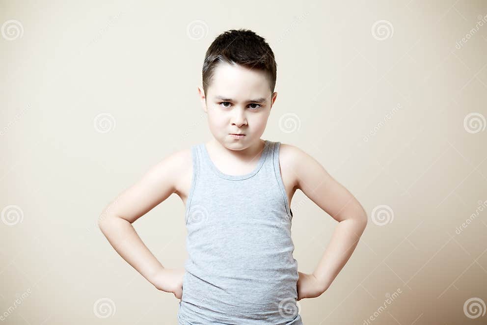Kid flexing biceps stock photo. Image of muscle, face - 70204500