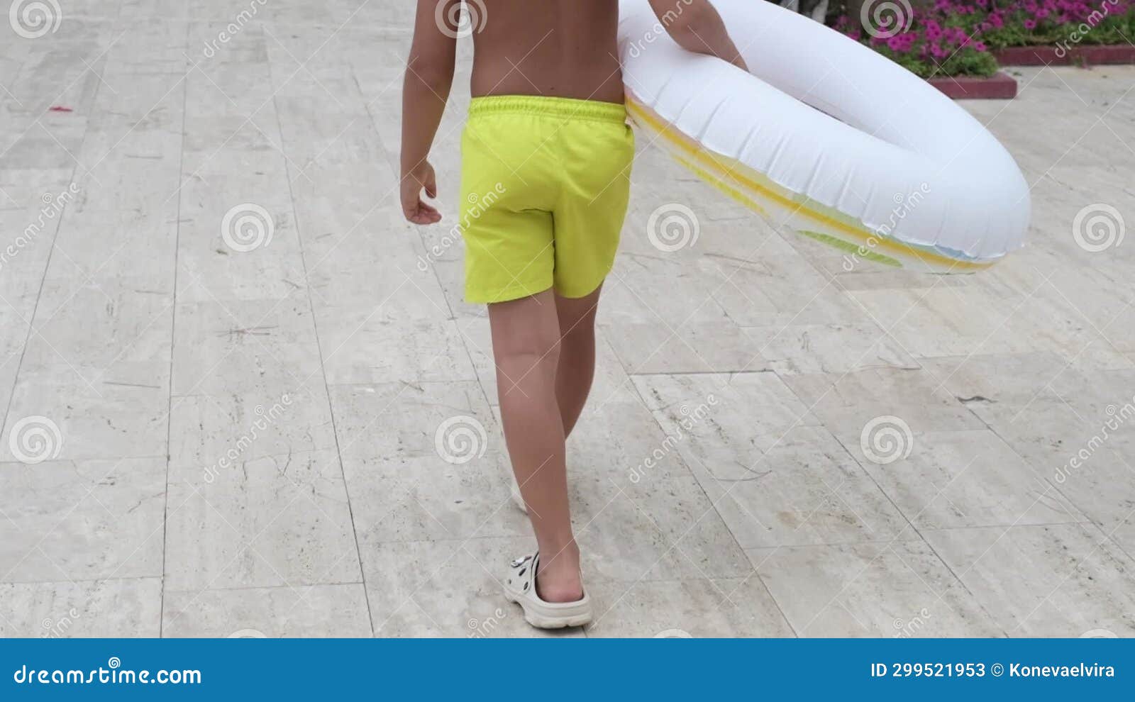 A Child Marches Confidently Towards the Pool, Floatie in Tow. it S a ...