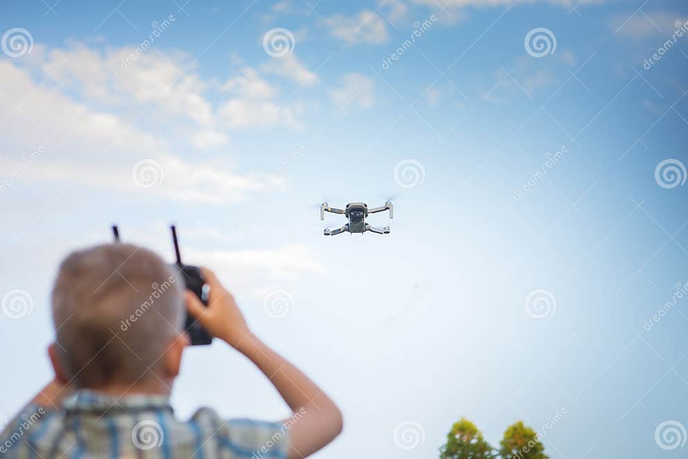 Kid Flying Drone. Boy Operate Drones Stock Image - Image of electronics ...