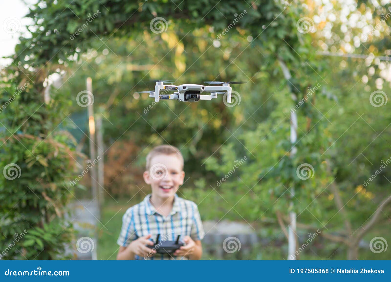 Kid Flying Drone. Boy Operate Drones Stock Photo - Image of outdoor ...