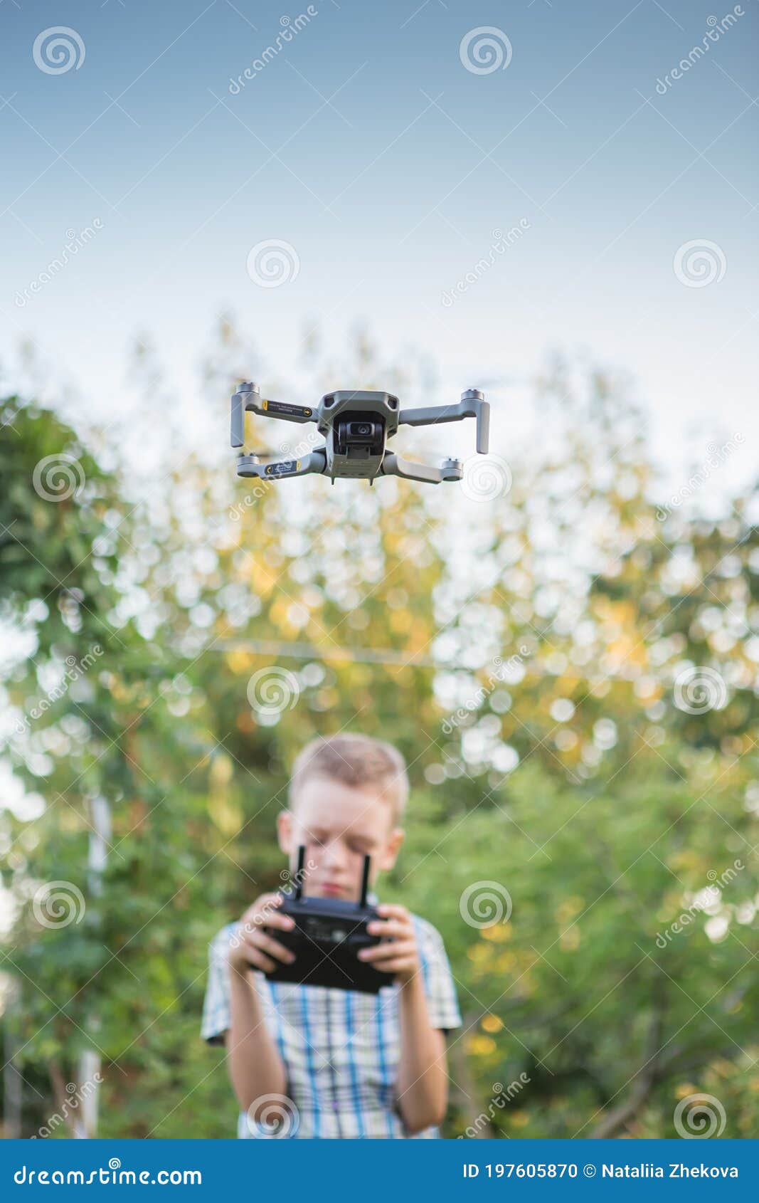 Kid Flying Drone. Boy Operate Drones Stock Photo - Image of operator ...