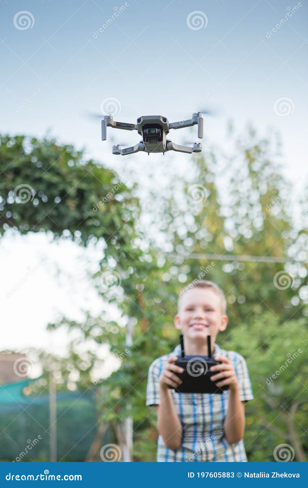 Kid Flying Drone. Boy Operate Drones Stock Image - Image of outdoor ...