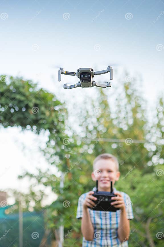 Kid Flying Drone. Boy Operate Drones Stock Image - Image of operation ...