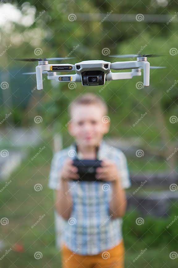 Kid Flying Drone. Boy Operate Drones Stock Photo - Image of processing ...