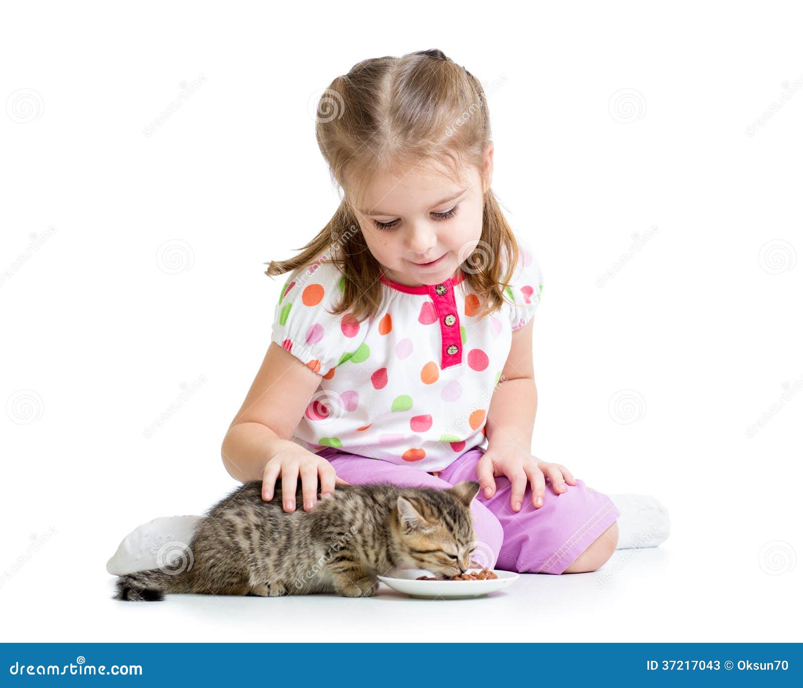 Kid Girl Feeding Cat Stock Photos - Image: 37217043