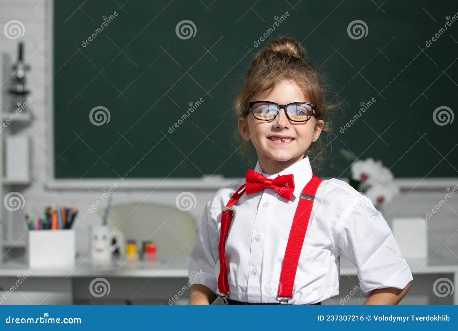 Kid Girl Learning Lesson at School. Elementary School Child in Class ...