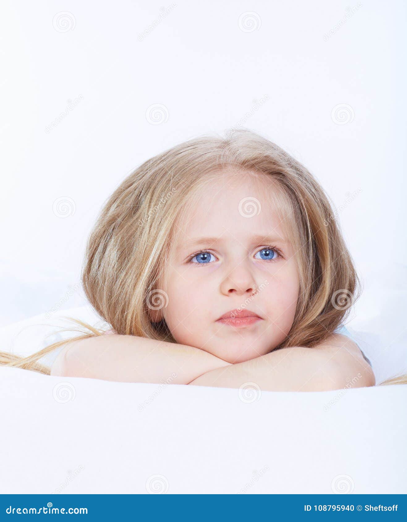 Kid girl lie on bed. stock photo. Image of curly, cute - 108795940