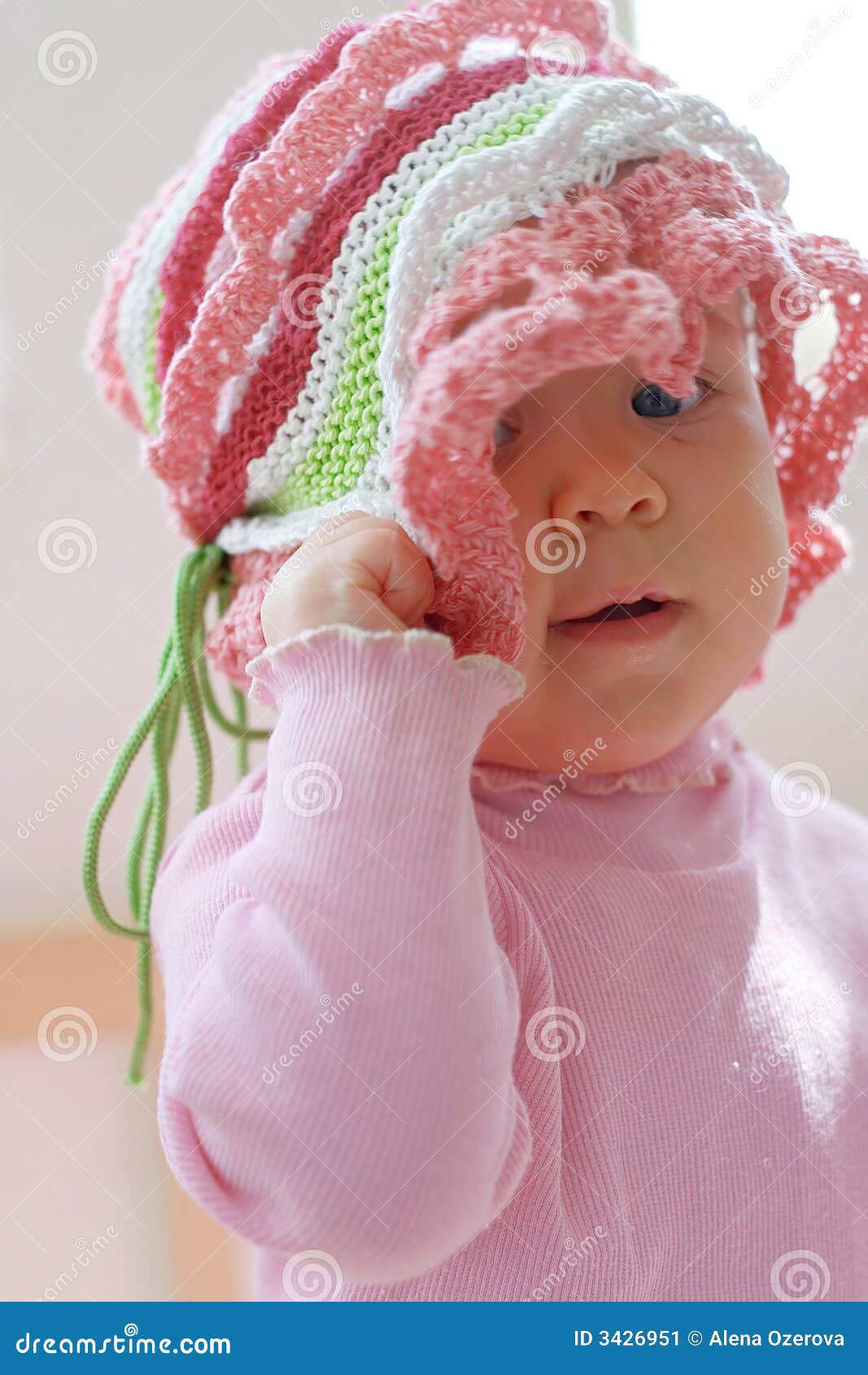 Kid girl removing her hat stock image. Image of daughter - 3426951