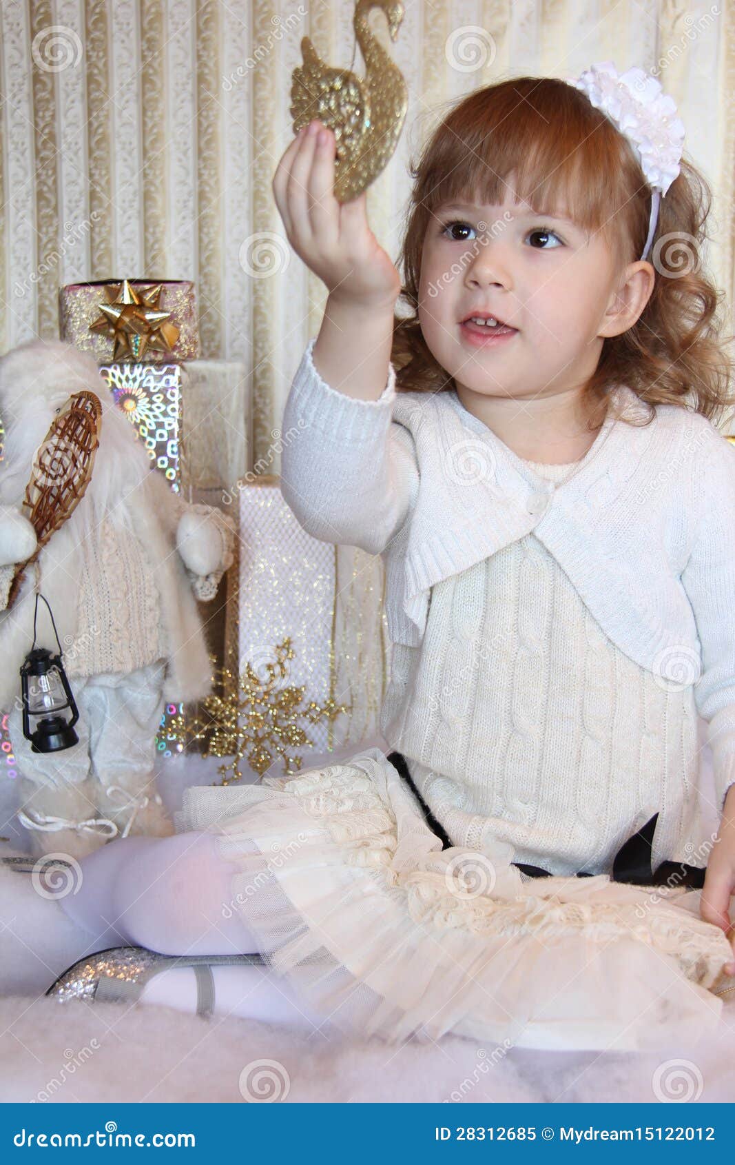 Kid with the gold swan stock image. Image of adorable - 28312685