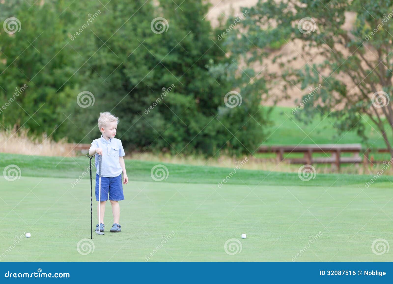 Kid at the golf course stock photo. Image of golfer, landscape - 32087516