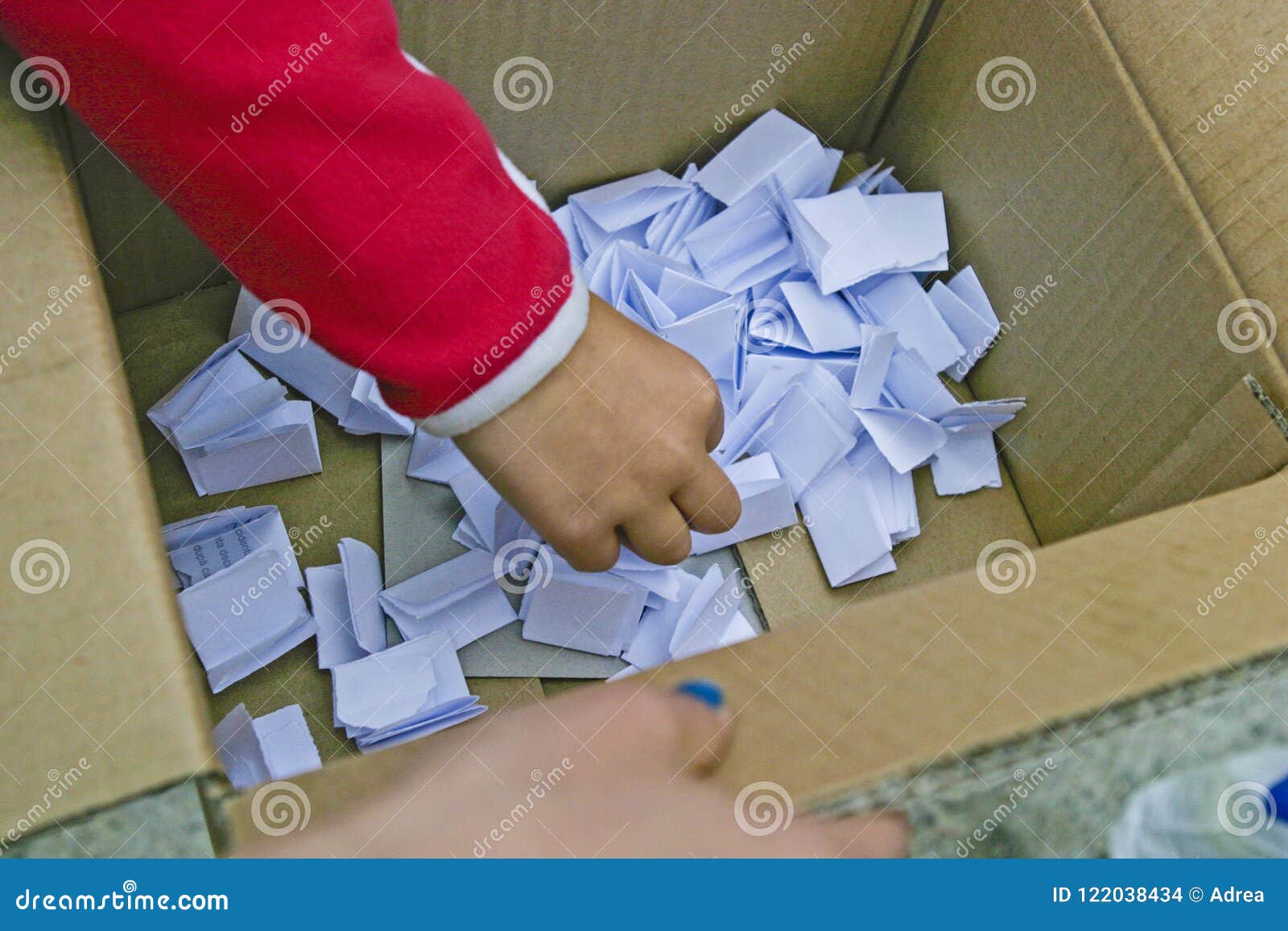 Kid Hand Picking a Raffle Ticket Stock Photo - Image of mixed, raffle ...