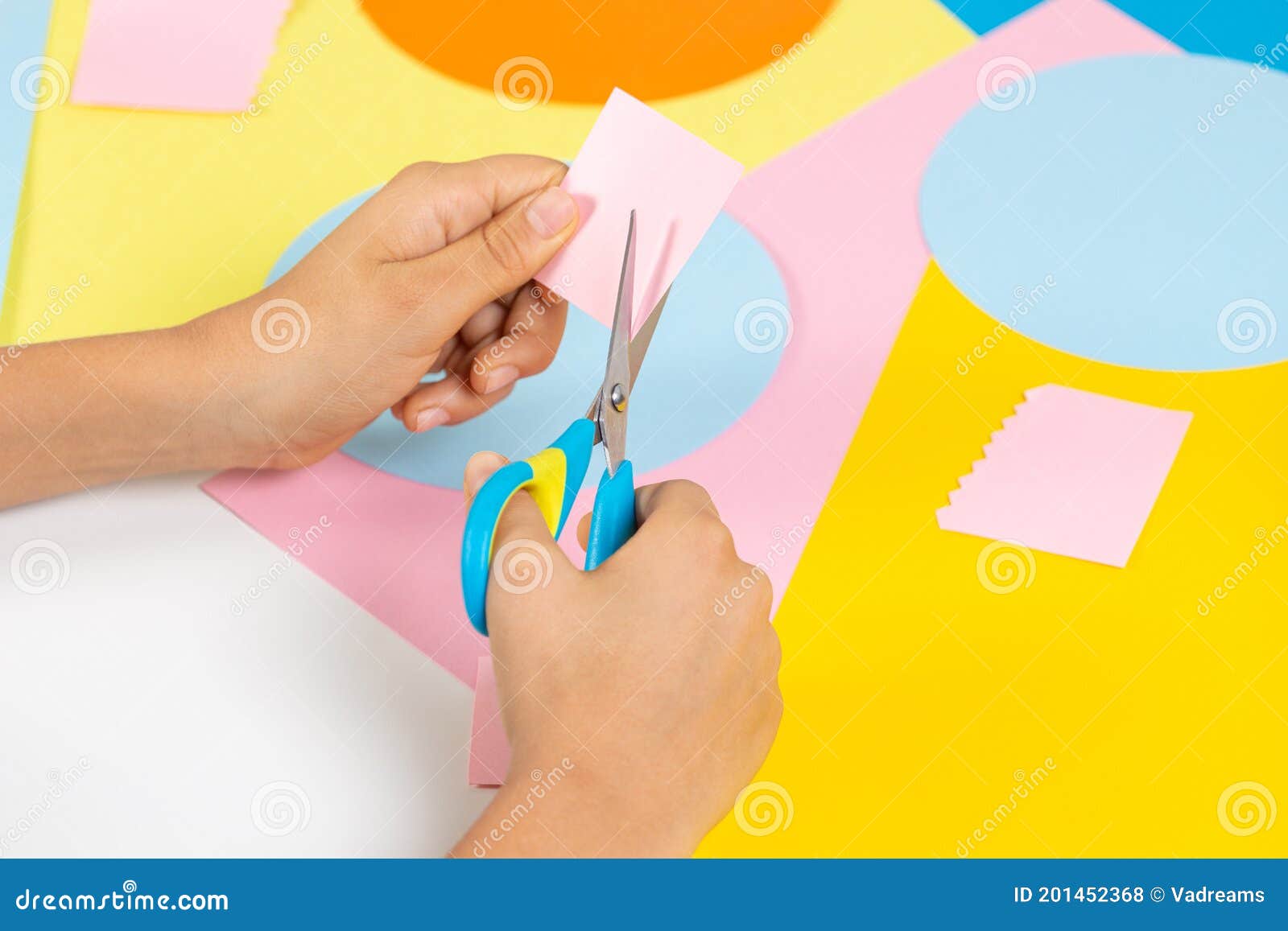 Kid Hands Cutting Colored Paper with Scissors. Education, Learning ...