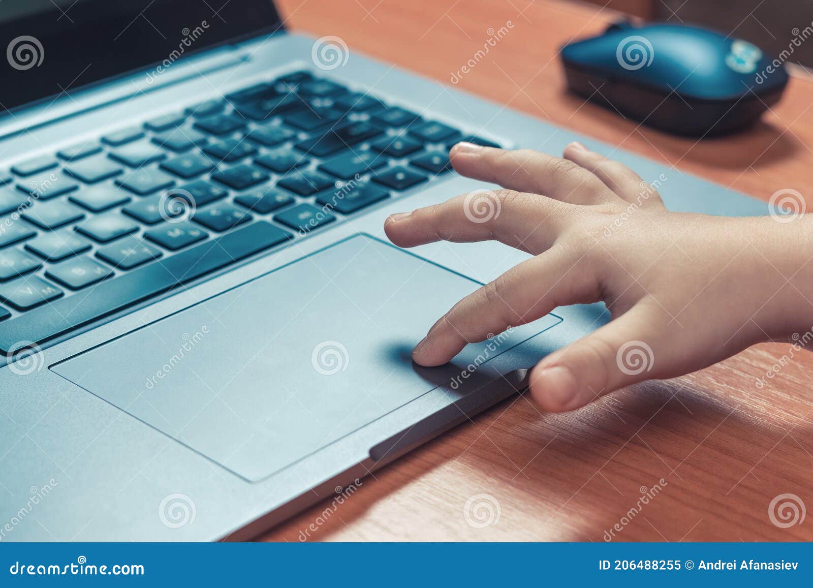 Kid Hands on Laptop Touchpad, Child Learns and Plays on Computer Stock ...