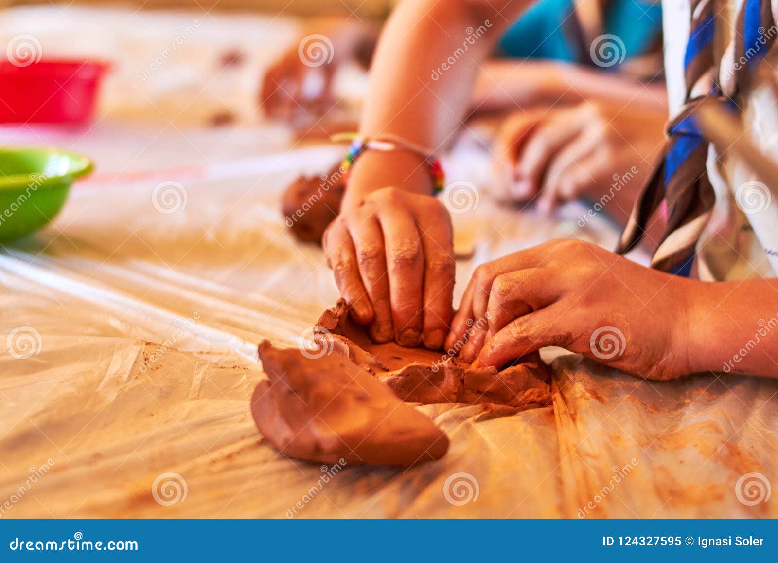 Kid playing with clay stock image. Image of craft, blue - 124327595