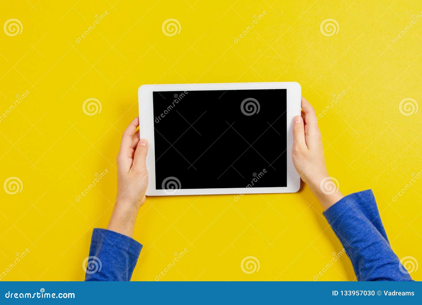 Kid Hands with Tablet Computer on Yellow Background Stock Photo - Image ...