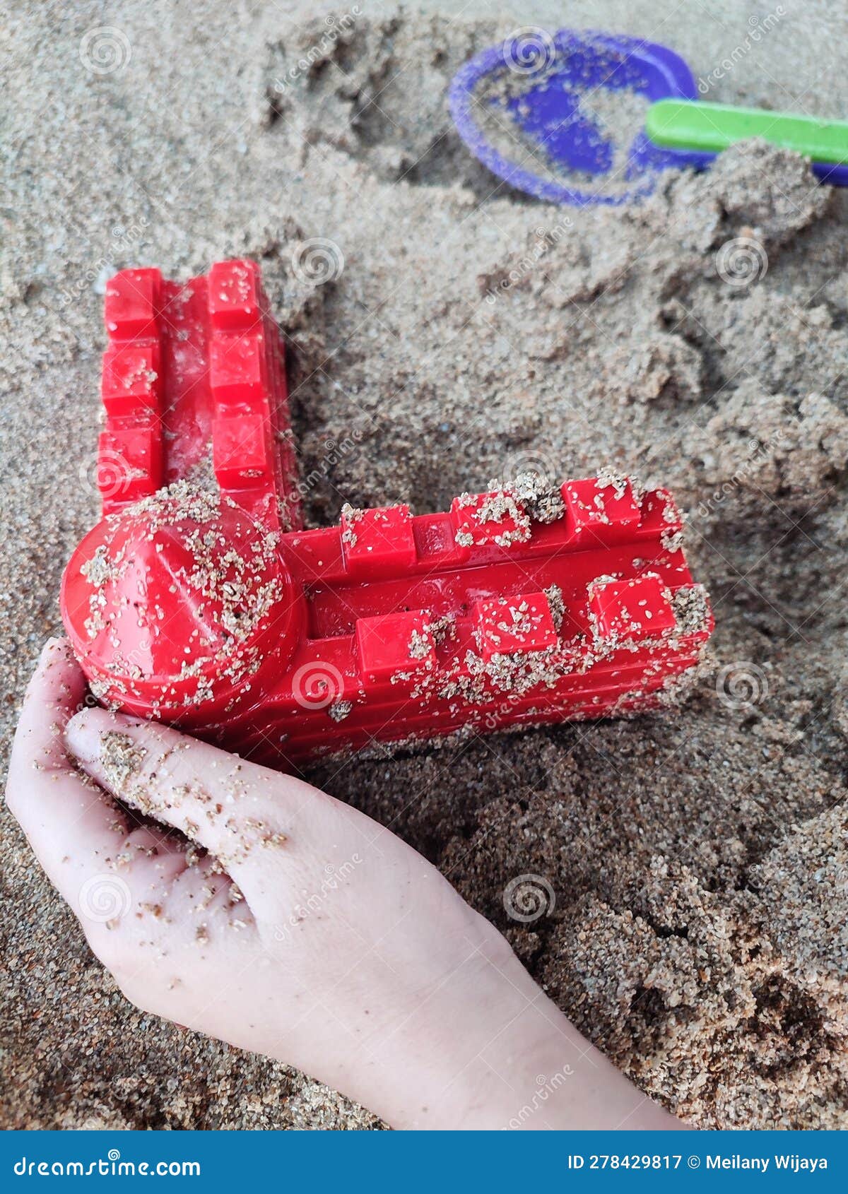 A Kid Having Fun Playing with Sand at the Beach Stock Image - Image of ...
