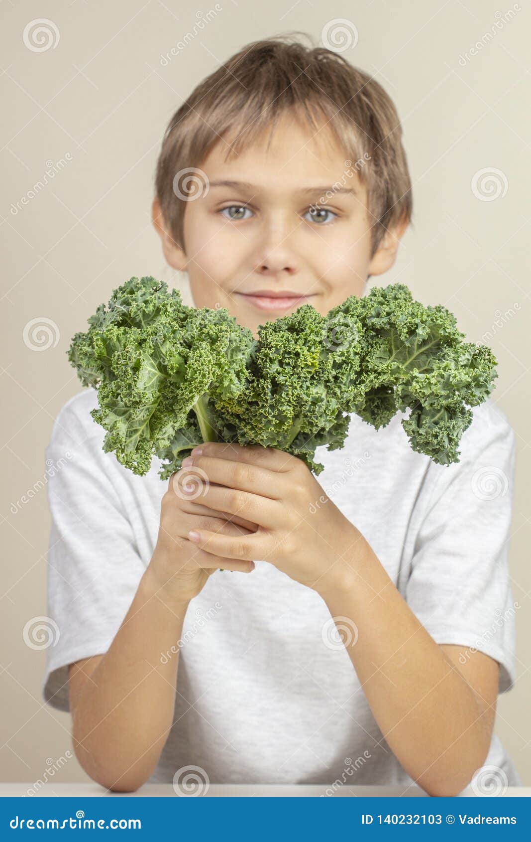 Kid with Healthy Vegetables. Boy Holding Fresh Kale Leaves Stock Image ...