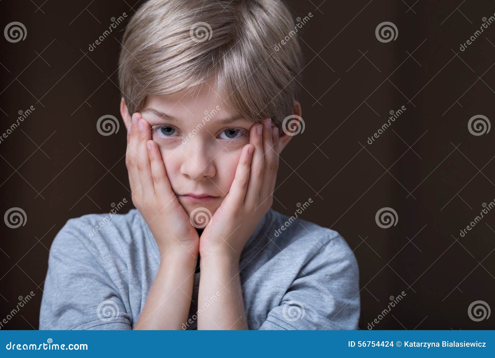 Kid Holding Face between Hands Stock Photo - Image of behaviour, mind ...