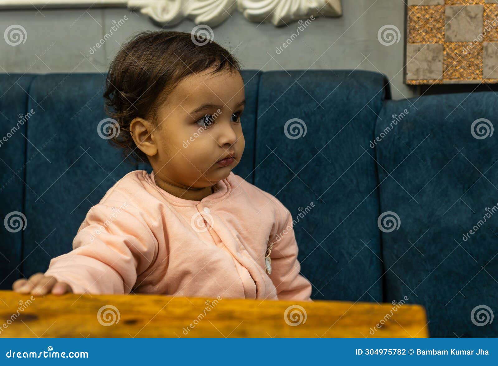 Kid Innocent Face Expression Sitting at Sofa at Night Stock Photo ...
