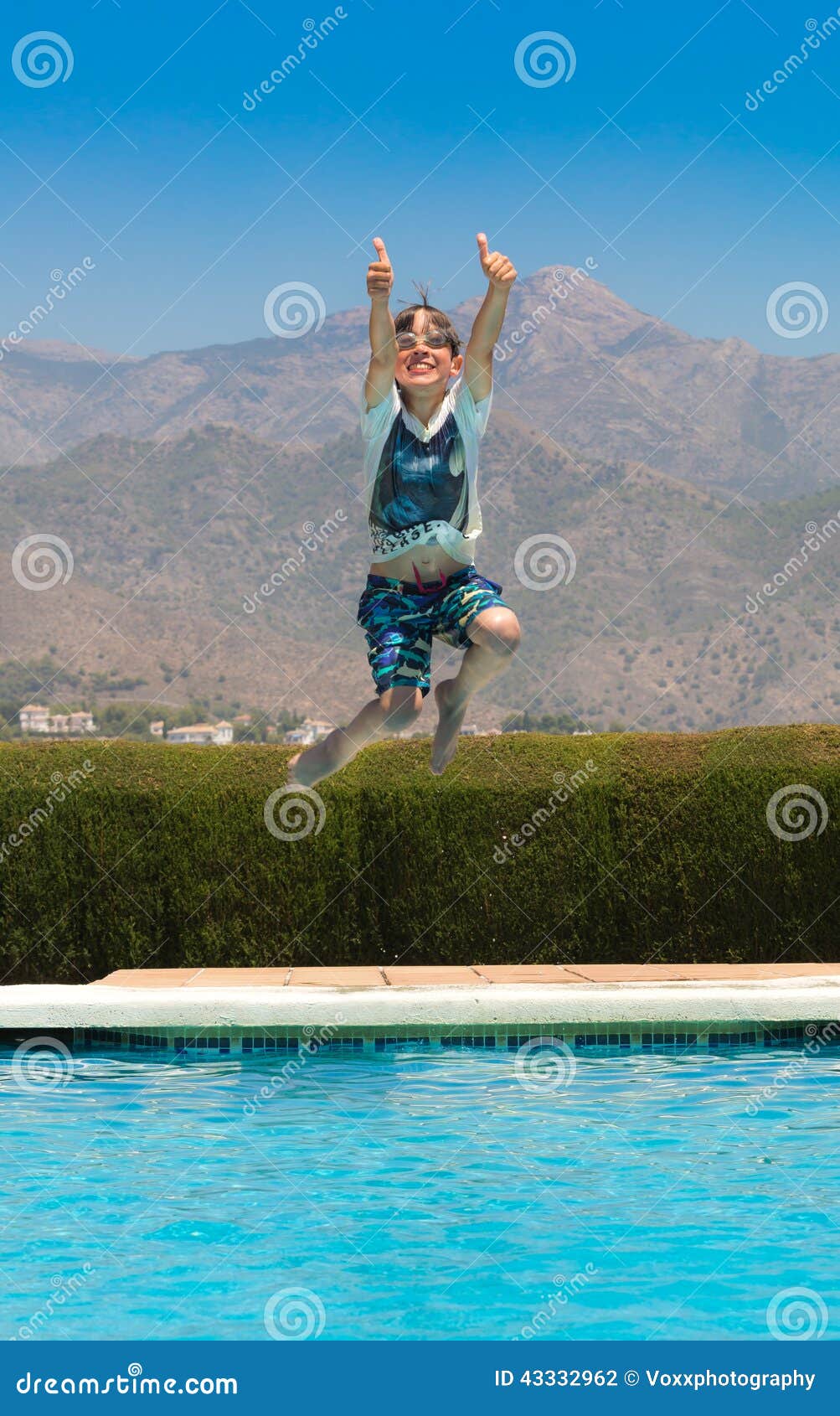 Kid jumping into pool stock photo. Image of outside, mountains - 43332962