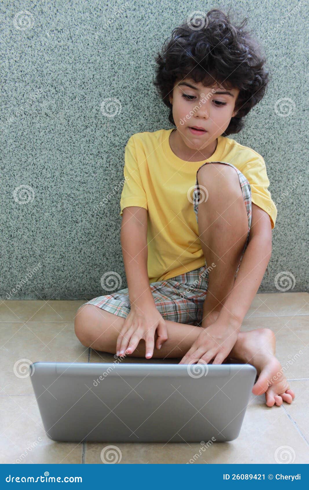 Kid with laptop stock image. Image of little, face, shoeless - 26089421