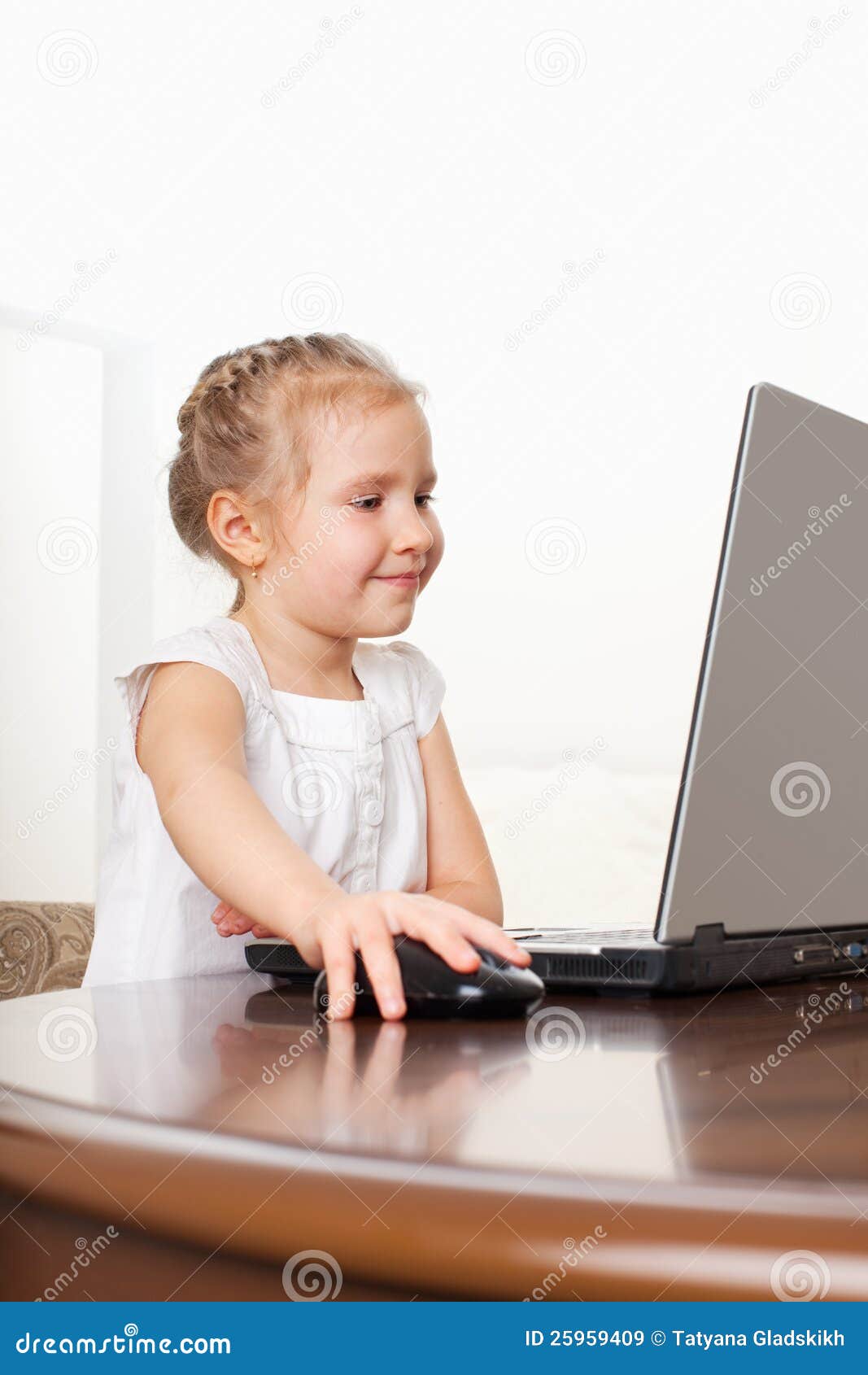 Kid with laptop at home stock image. Image of laptop - 25959409