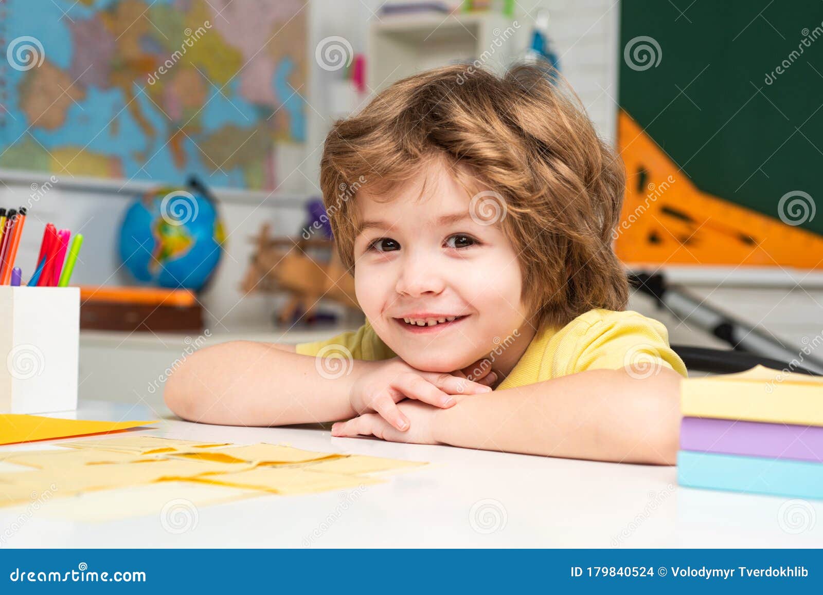 Kid is Learning in Class on Background of Blackboard. Learning and ...