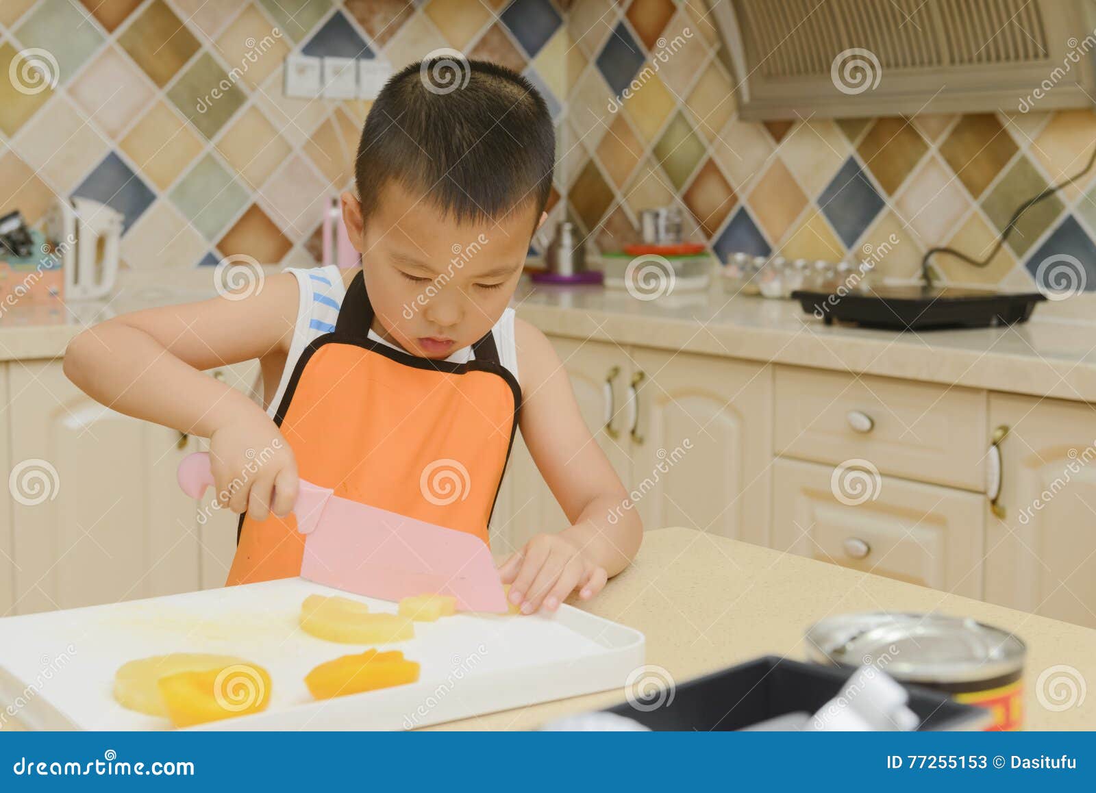 Kid learning to cook stock image. Image of child, chinese - 77255153