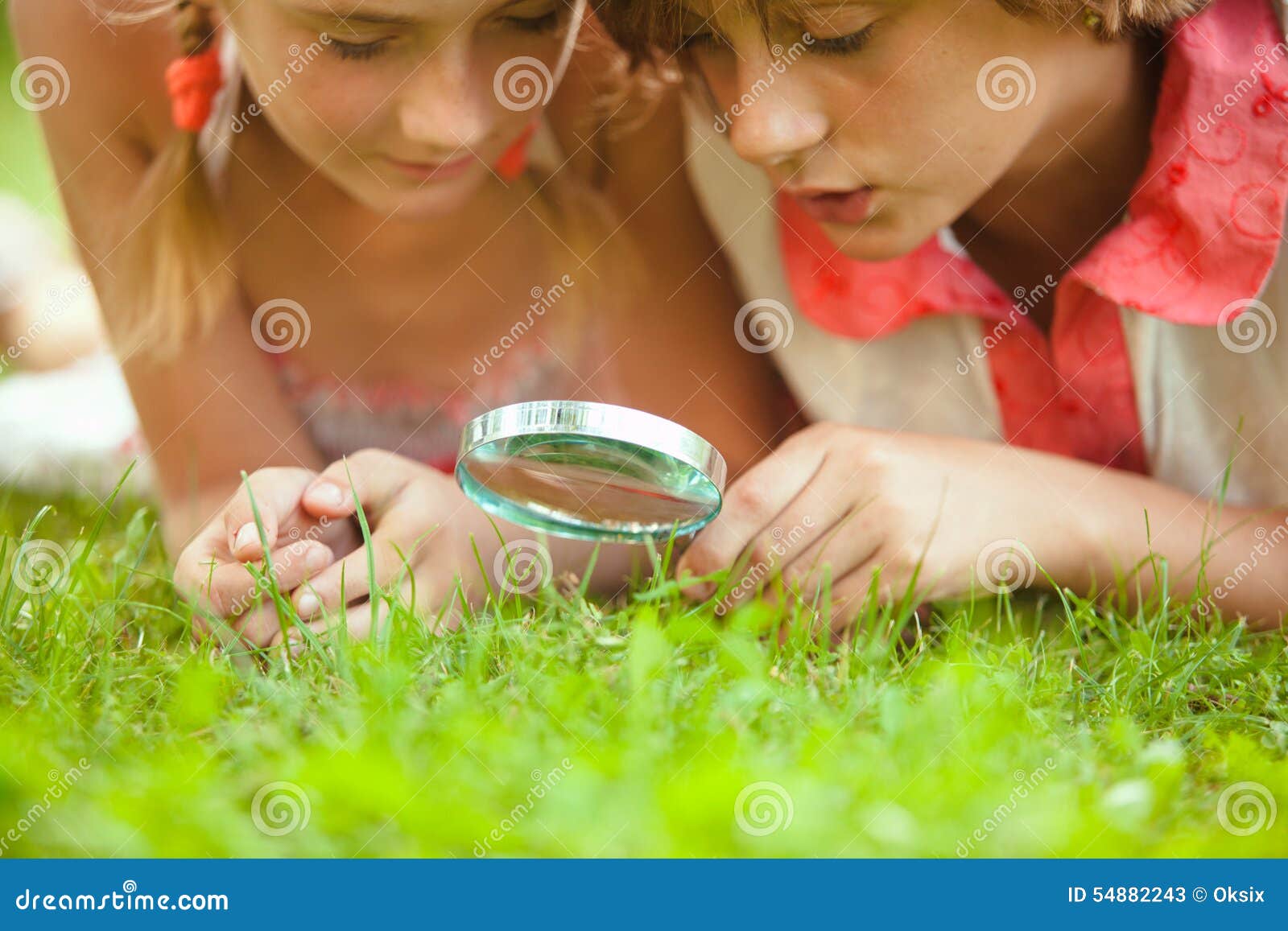 Kid with magnifying glass stock image. Image of exploring - 54882243