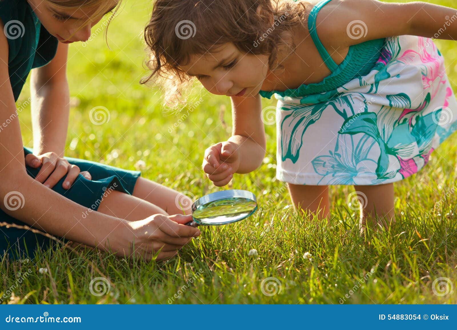 Kid with magnifying glass stock photo. Image of closeup - 54883054