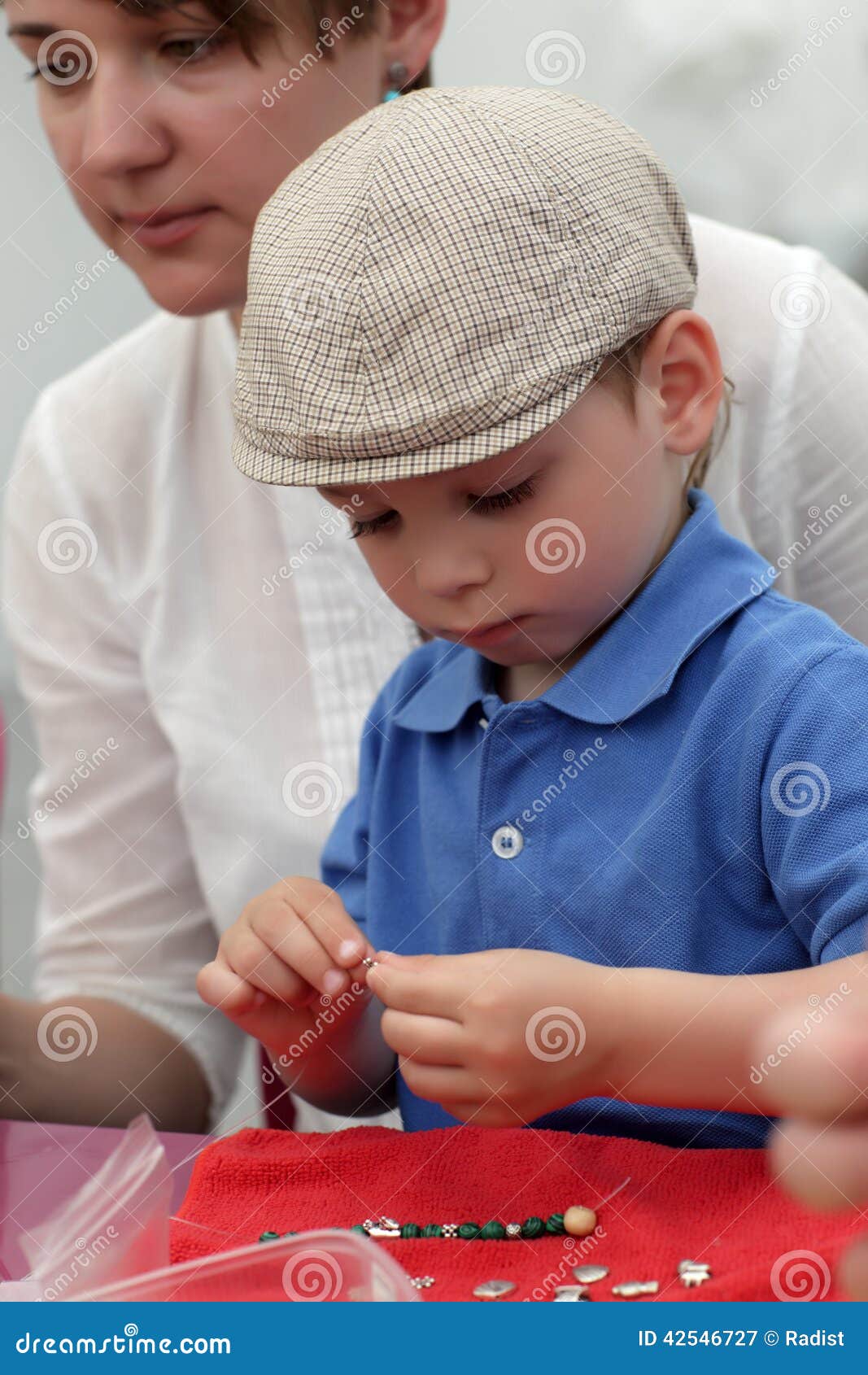 Kid making bracelet stock image. Image of culture, craftsperson - 42546727
