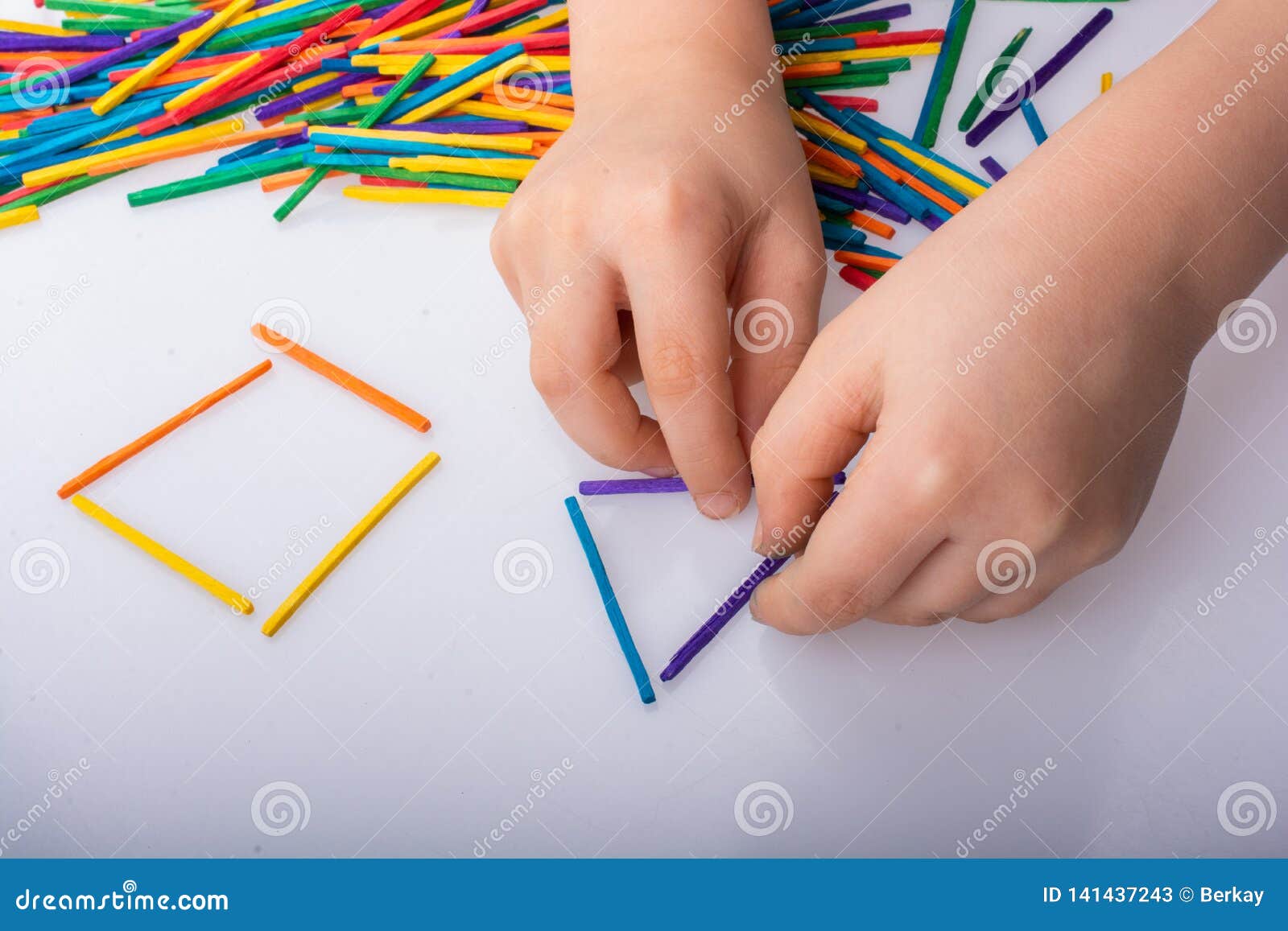 Kid Making Geometric Shapes with Colorful Sticks on White Background ...